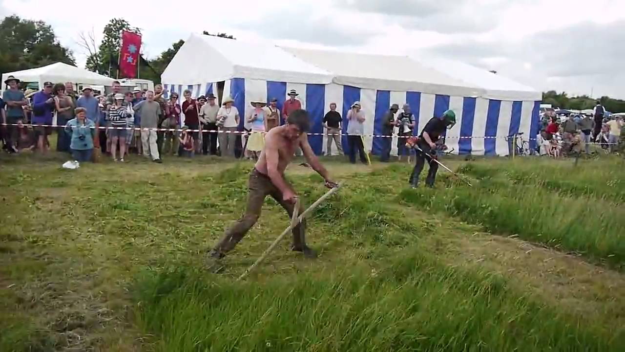 Old-fashioned scythe vs. bush cutter.