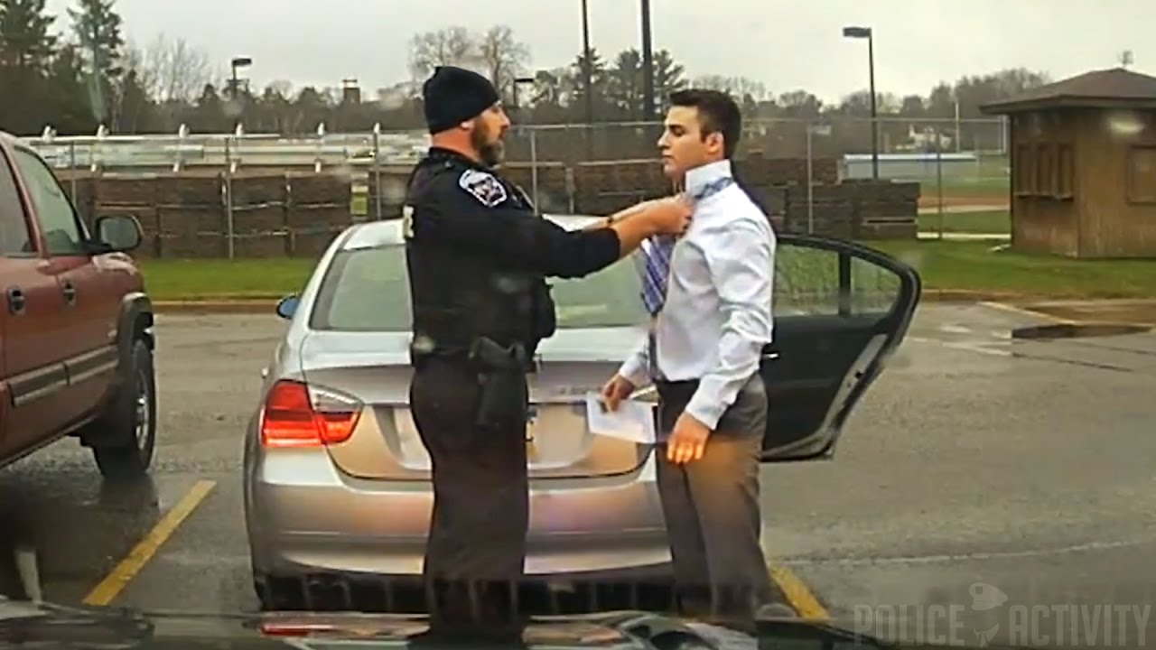 Dashcam Shows Cop Helping Speeding Student With His Tie