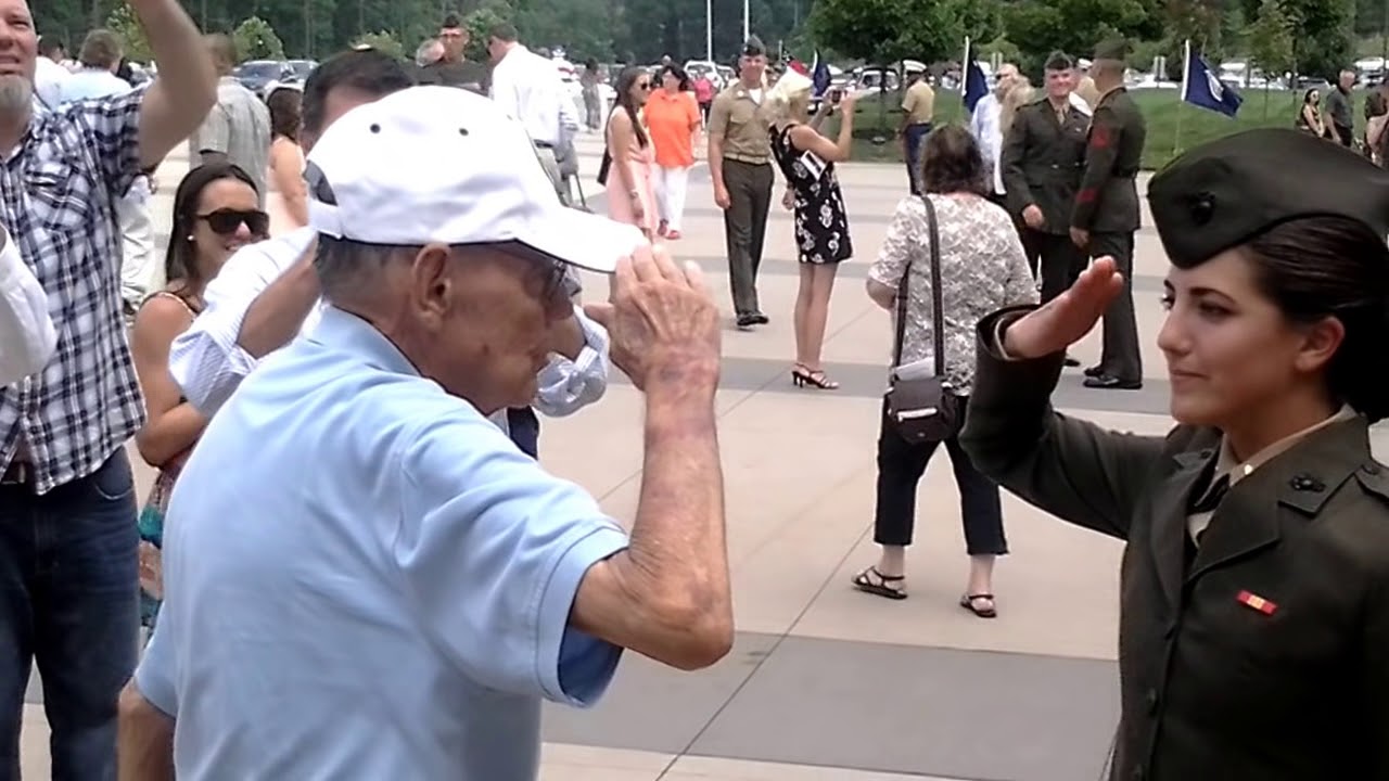 Grandfather delivers granddaughter's first salute