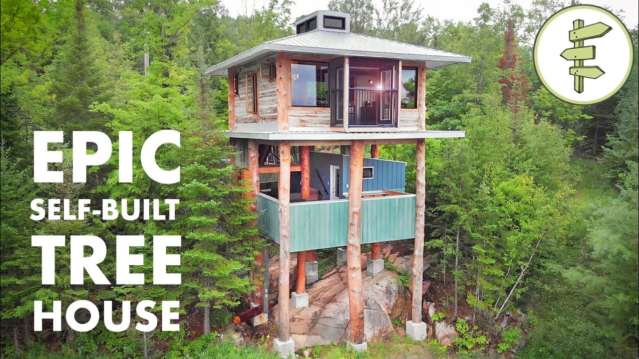 Charming 2-story tree house built with reclaimed materials