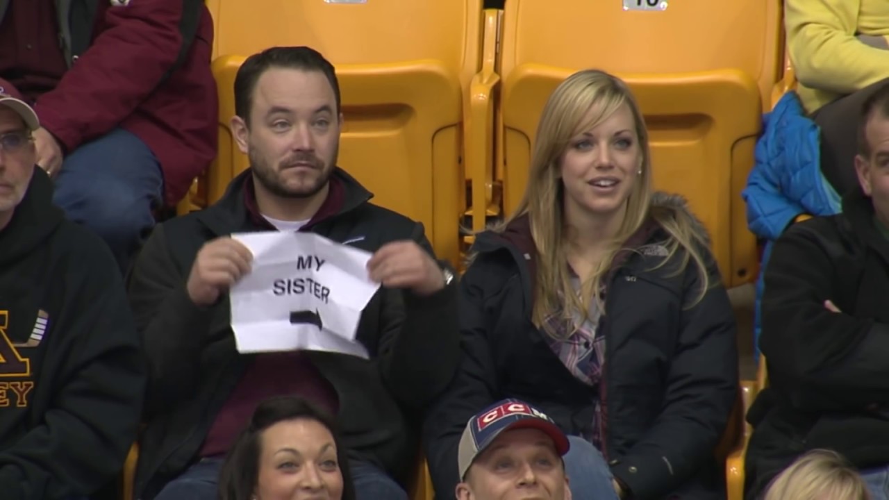 Hilarious Kiss Cam sign.