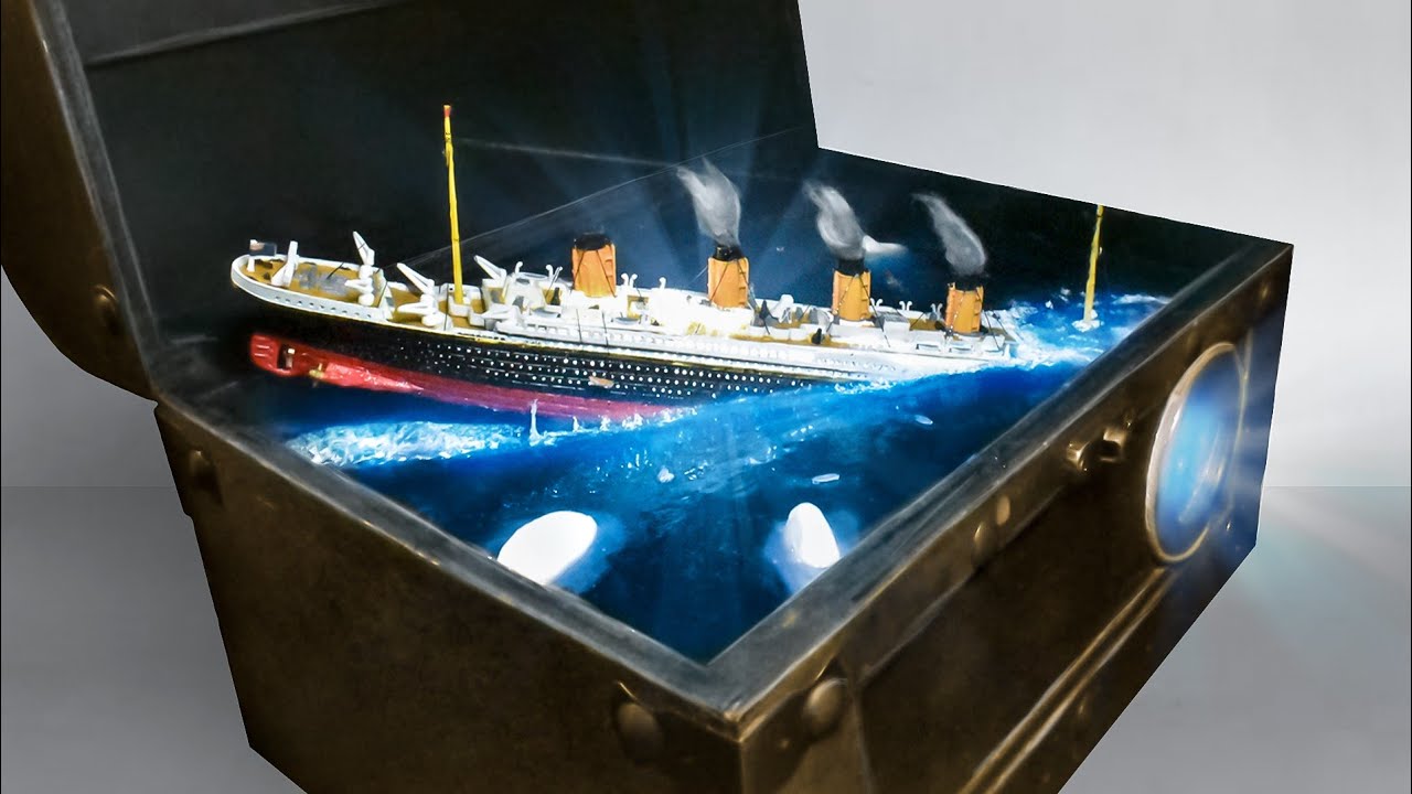 A diorama of the Titanic sinking in a treasure chest