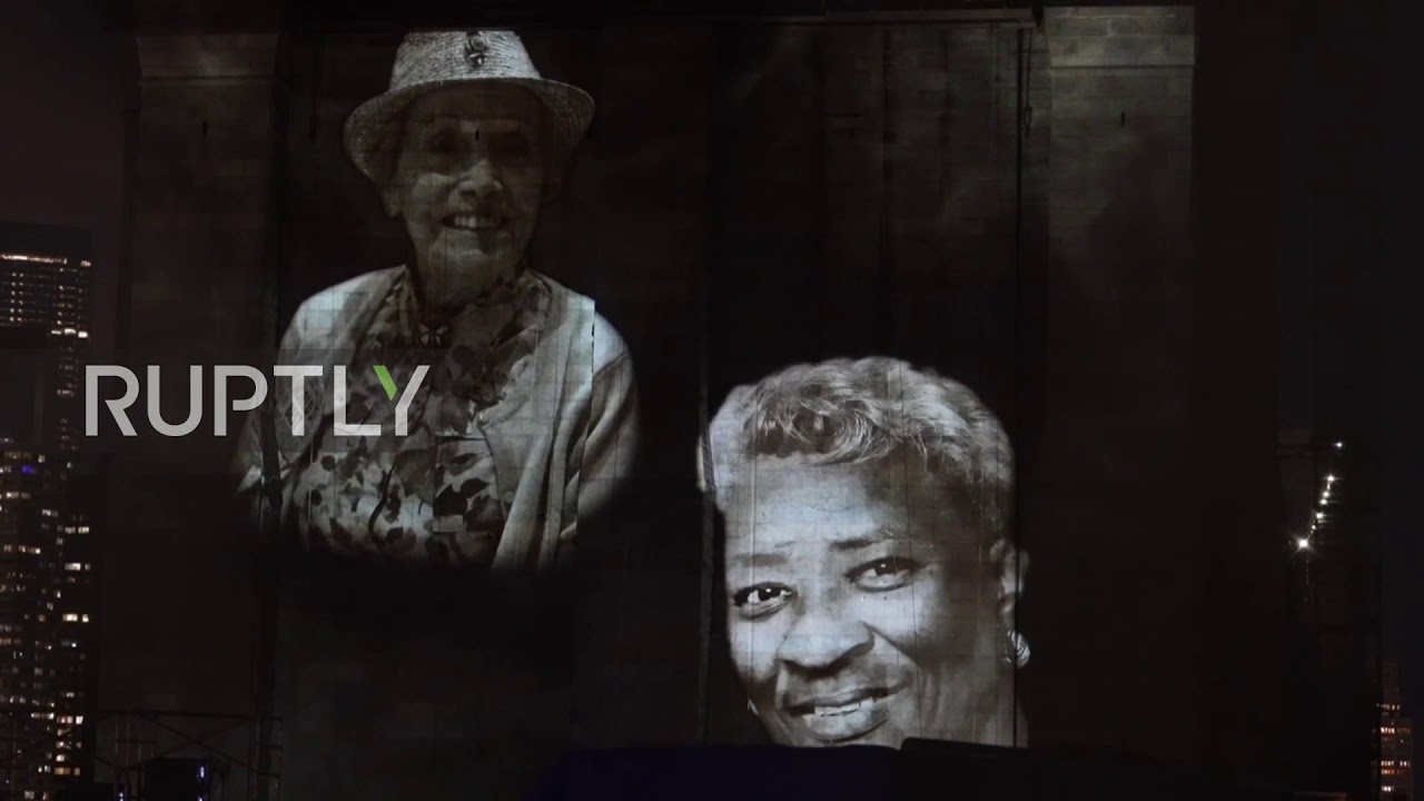 Portraits of COVID victims projected on Brooklyn Bridge for NYC memorial