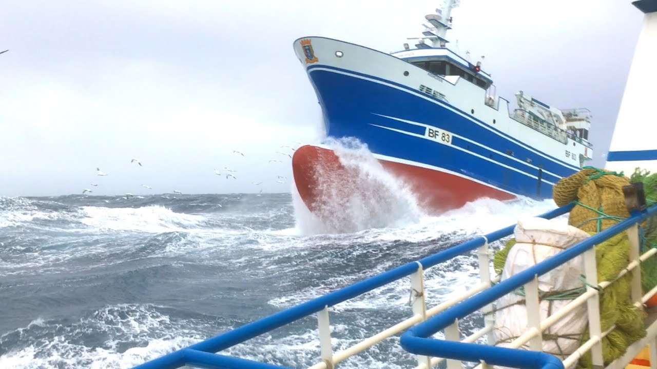 Fishing trawler caught in high seas storm.