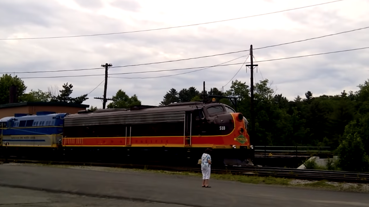 Guy gets super excited about trains