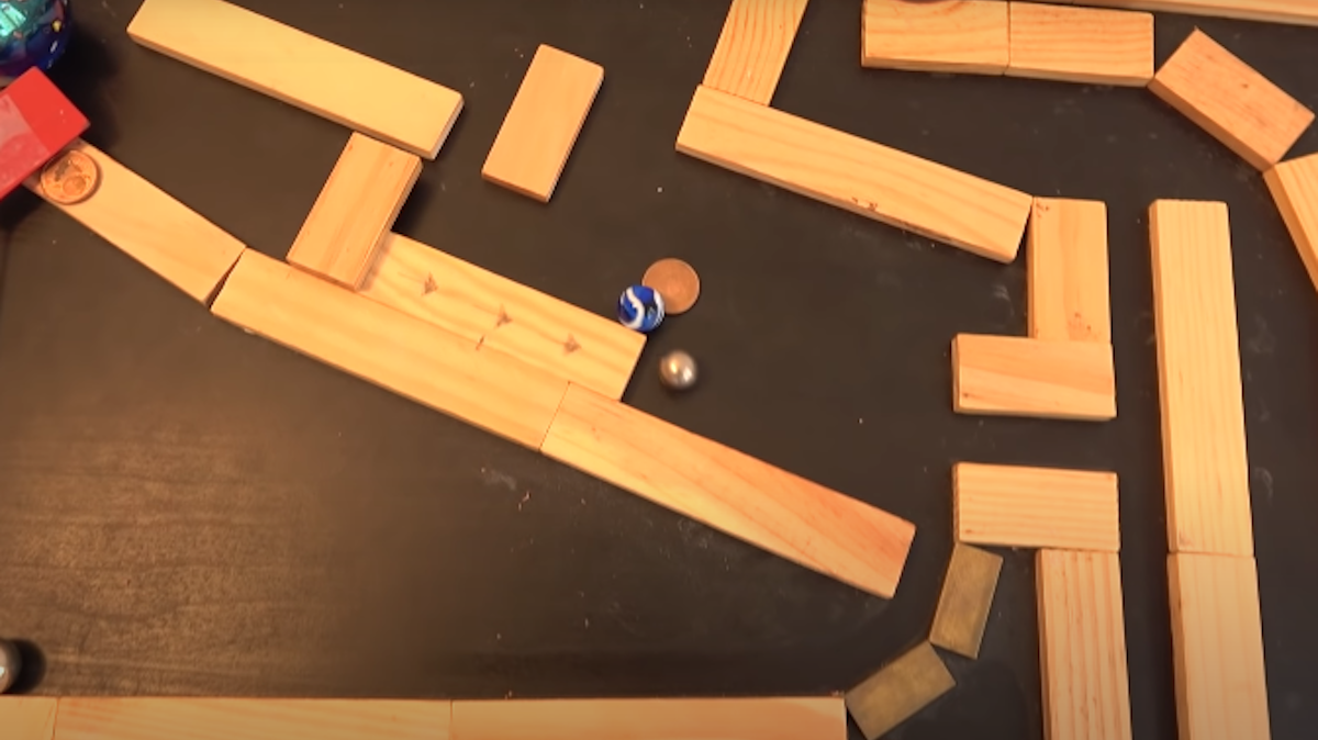 This chain reaction marble course is ridiculously inventive