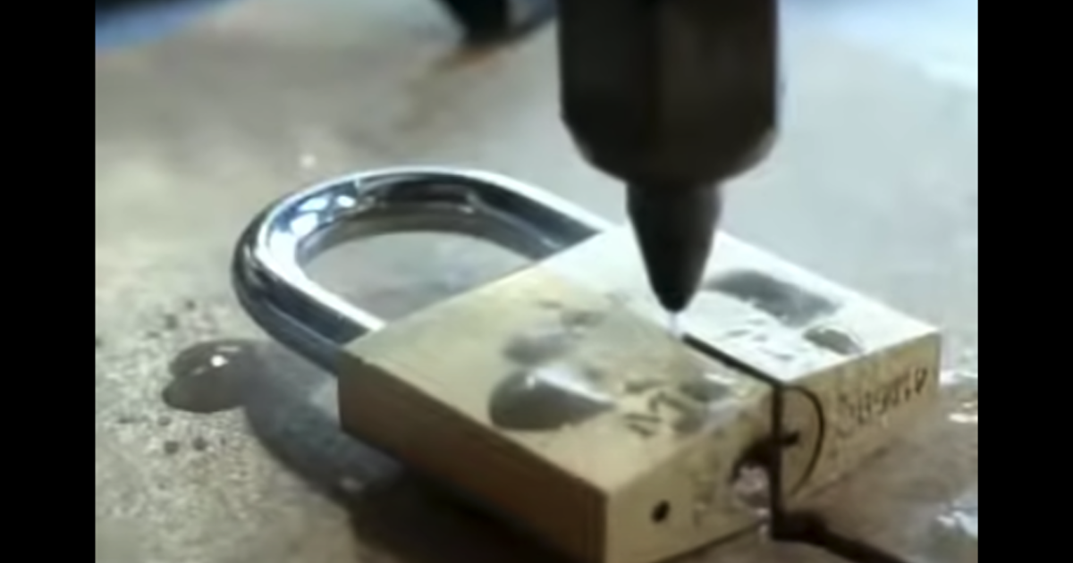 Using water pressure to cut a padlock in half