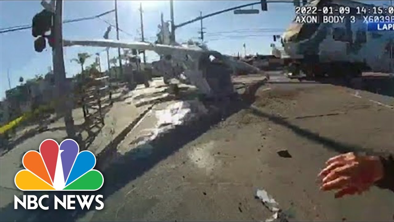 Police rescue pilot seconds before train collides with plane.