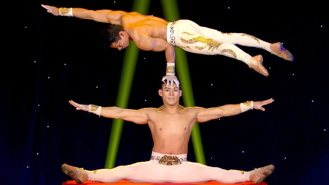 Incredible hand and head balance circus.