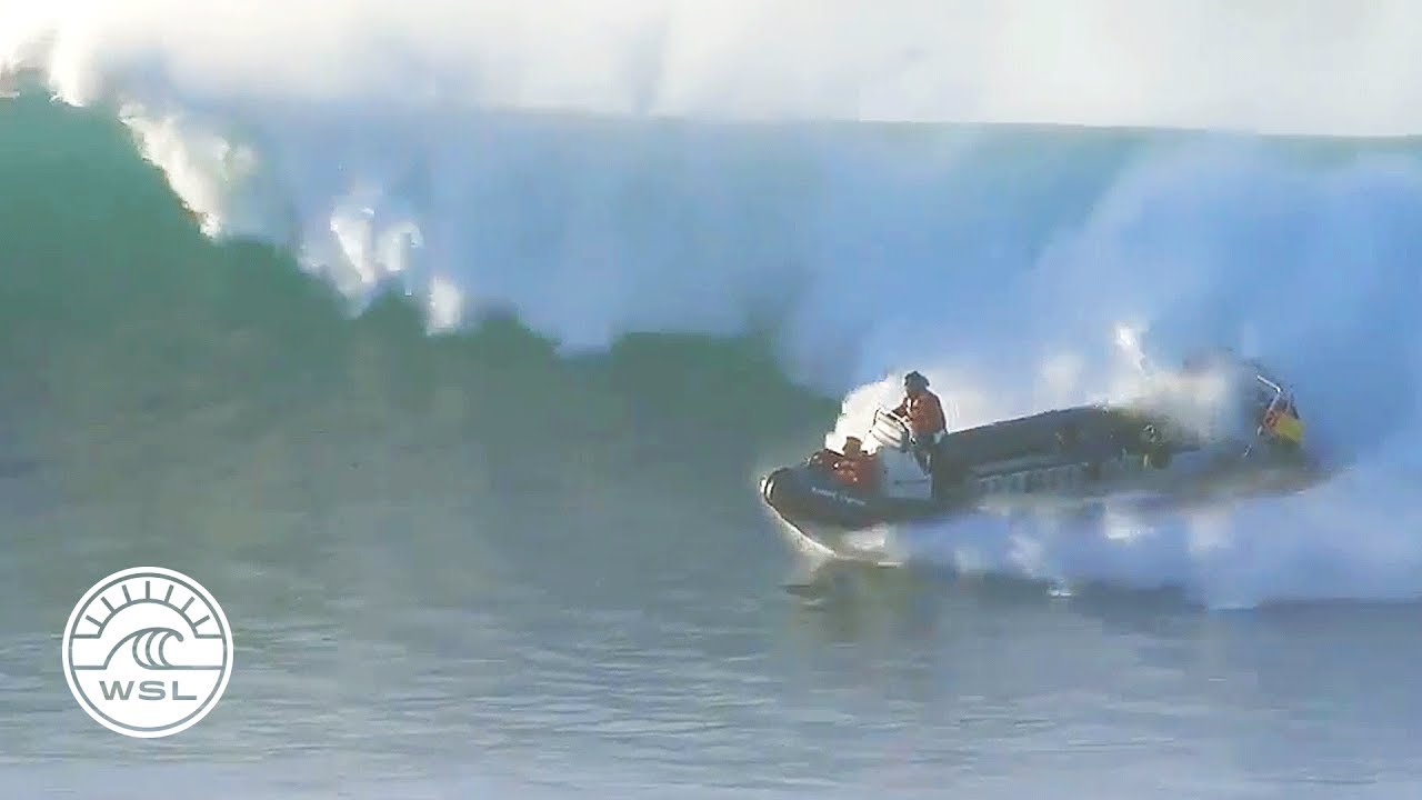 Safety boat gets caught inside massive waves