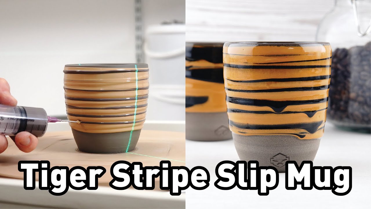 Making a tiger slip mug.