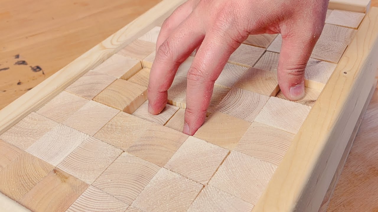 Man makes springy wooden cushion.