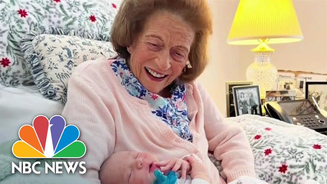 99-year-old woman meets her 100th great-grandchild.