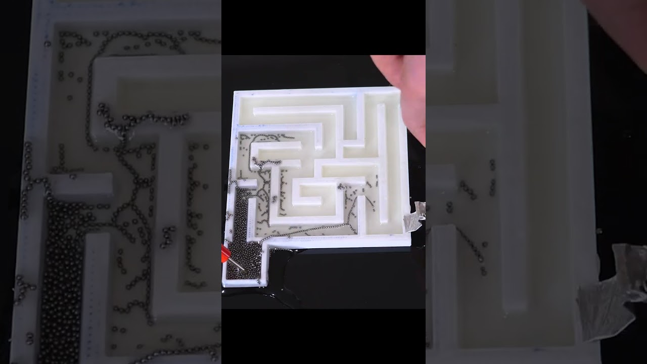 Self-assembling wires solve a maze.