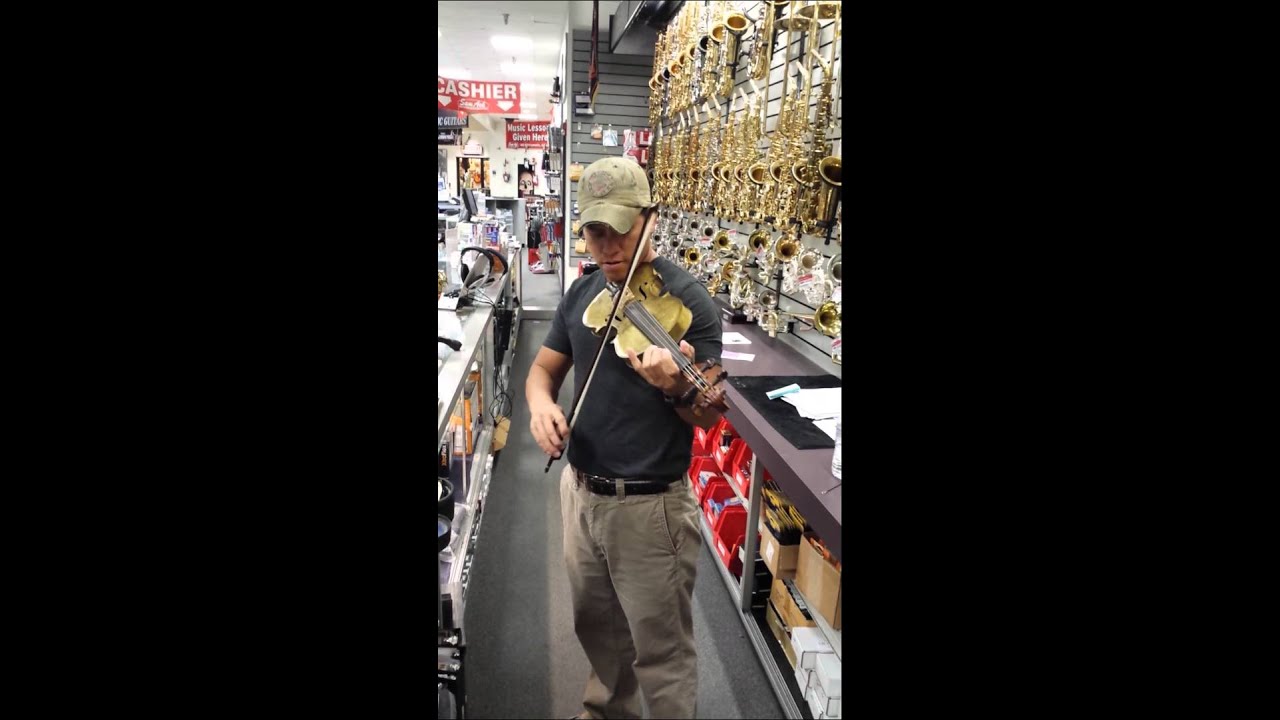 The sound of a brass violin.