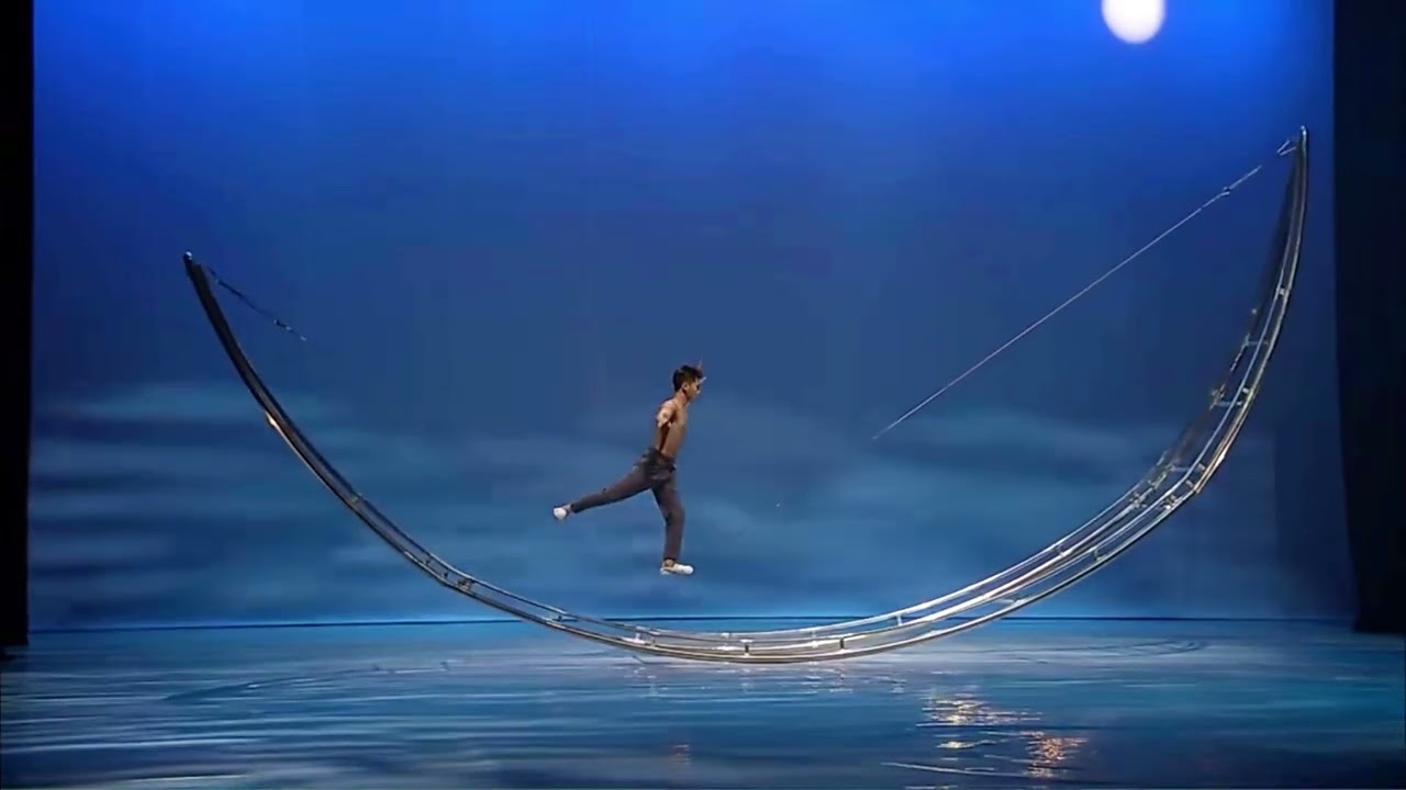 Stunning Cirque du Soleil wire rope routine.