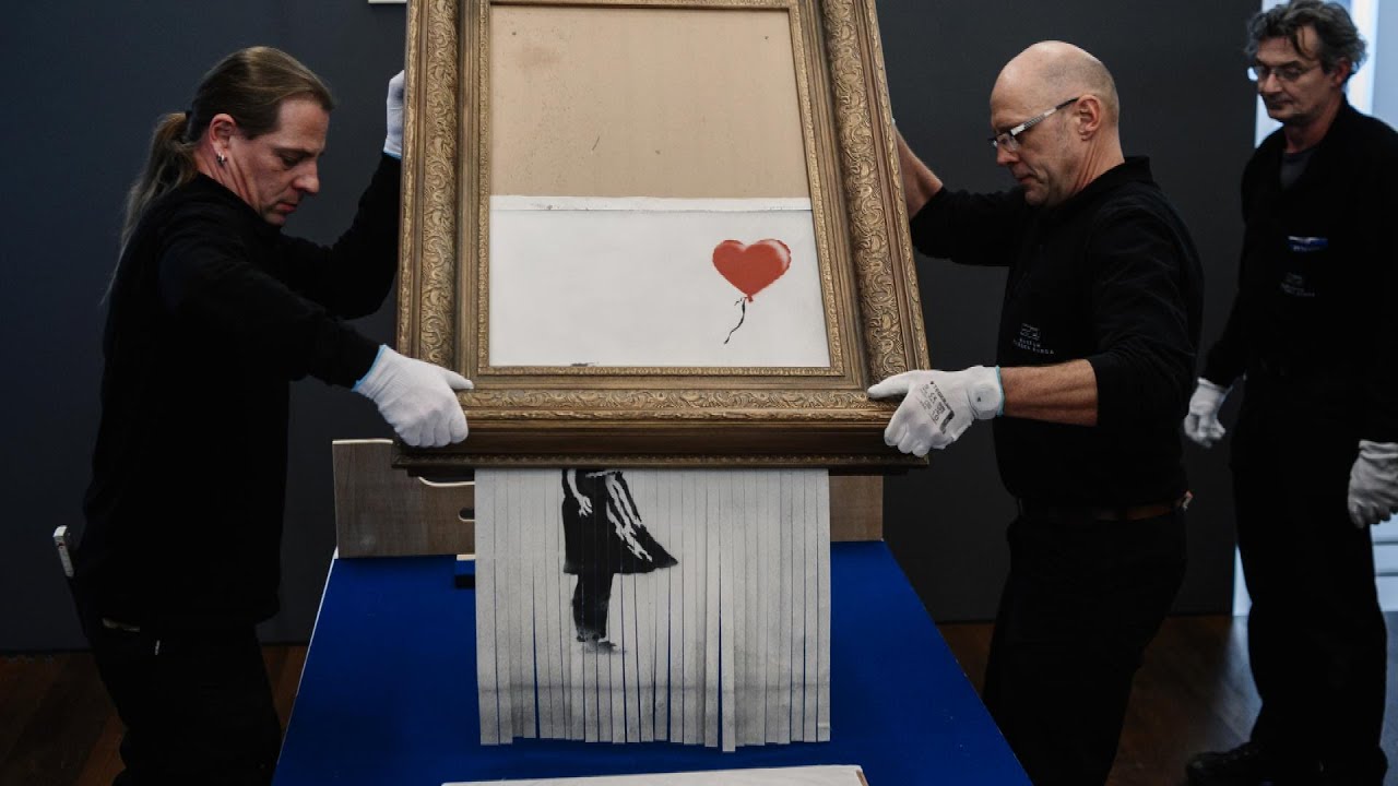 Famously shredded painting sells for $25.4M.