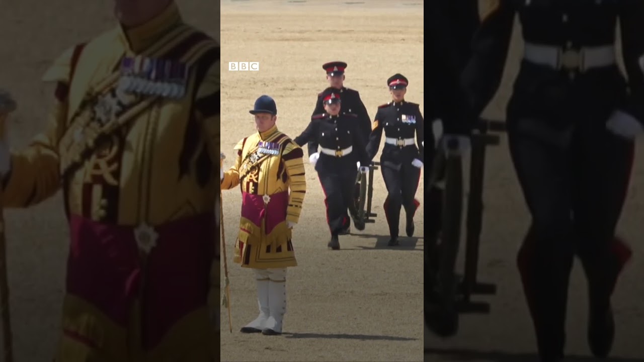 Soldier carries on playing after fainting in heatwave.
