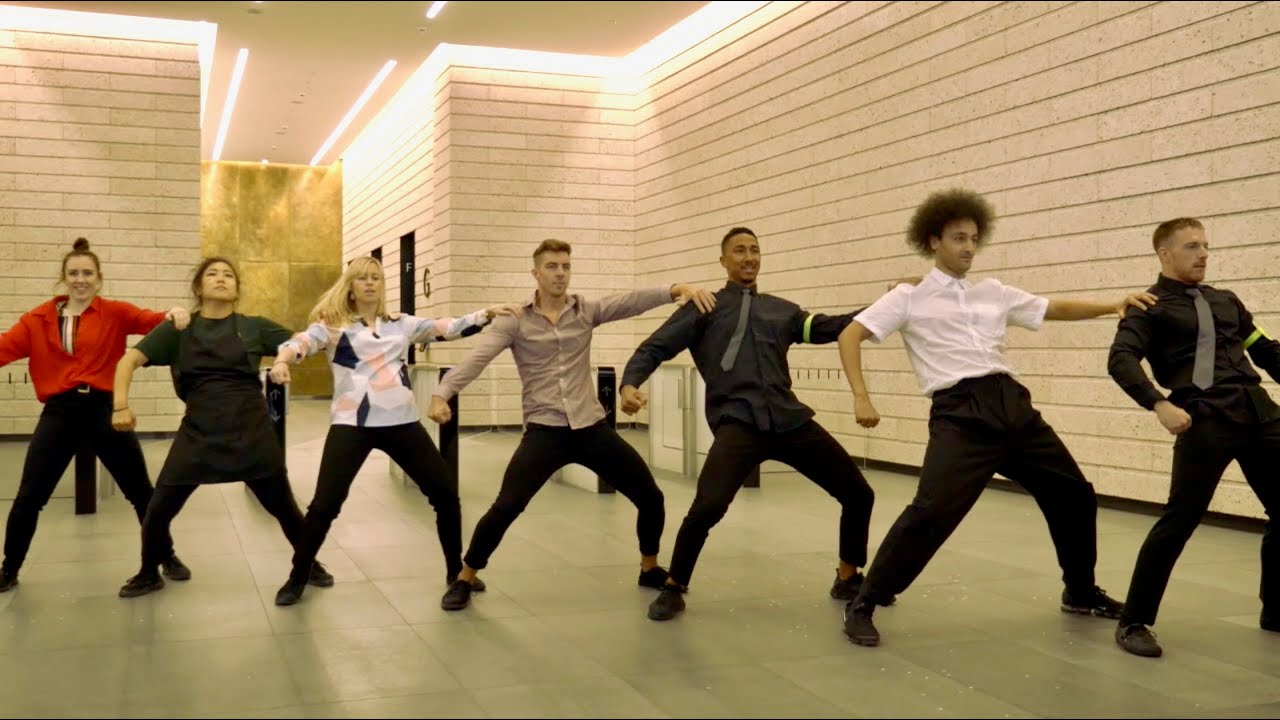 Flash mob crashes corporate ceremony.