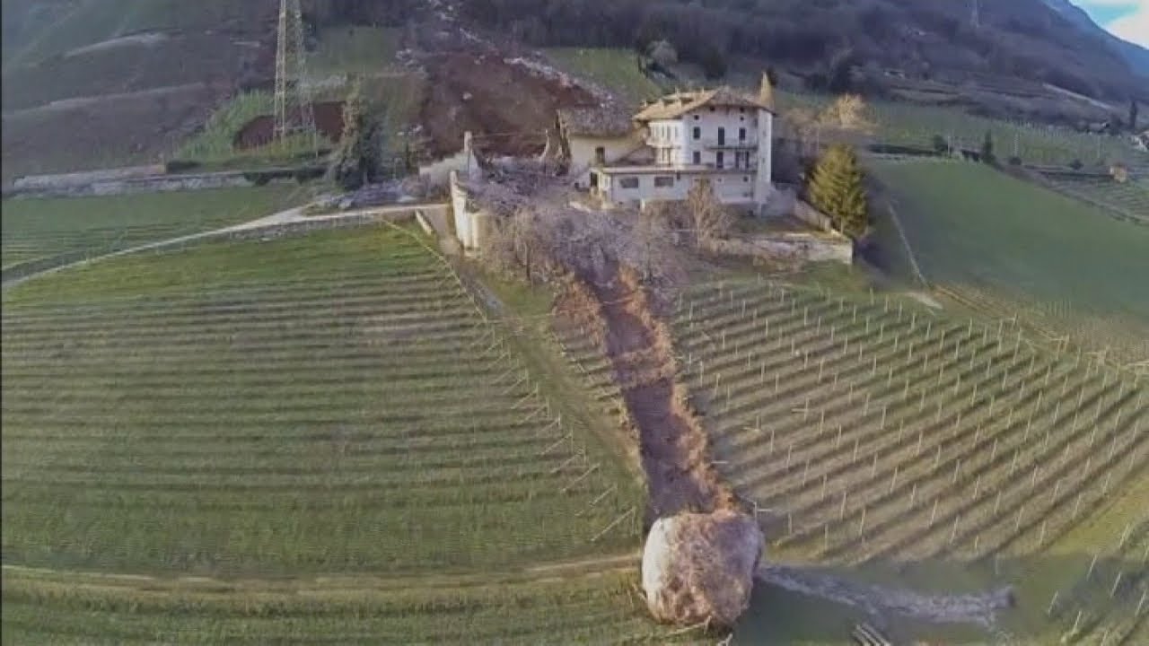 Falling boulders create massive landslide.