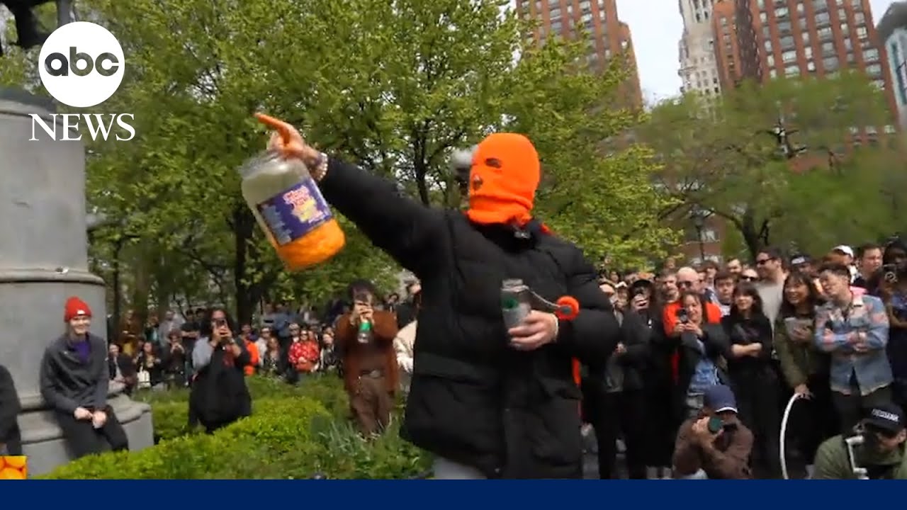 "Cheeseball Man" delights NYC crowd.