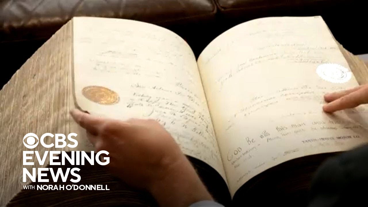 Giant book with historical signatures is up for sale.